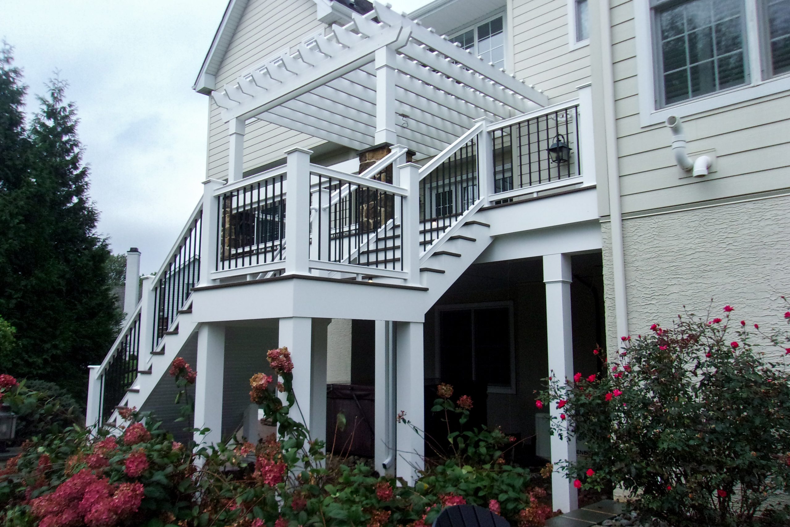 Deck with Stone Pillars and Pergola - Decks R Us
